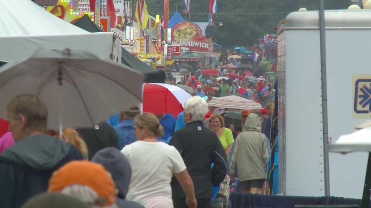 Iowans grab their umbrellas for first day of Iowa State Fair