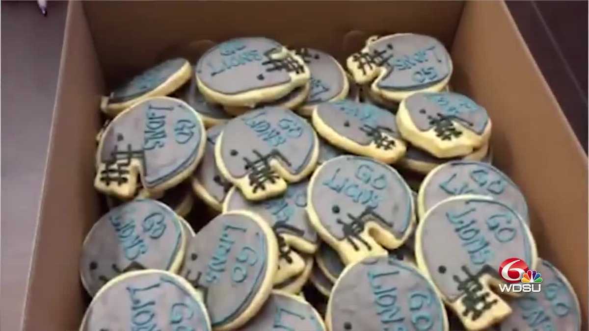 SURPRISE: WDSU photographer brings Detroit Lions cookies to Saints newsroom