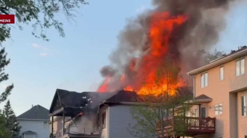 Video shows flames from roof during Johnston house fire