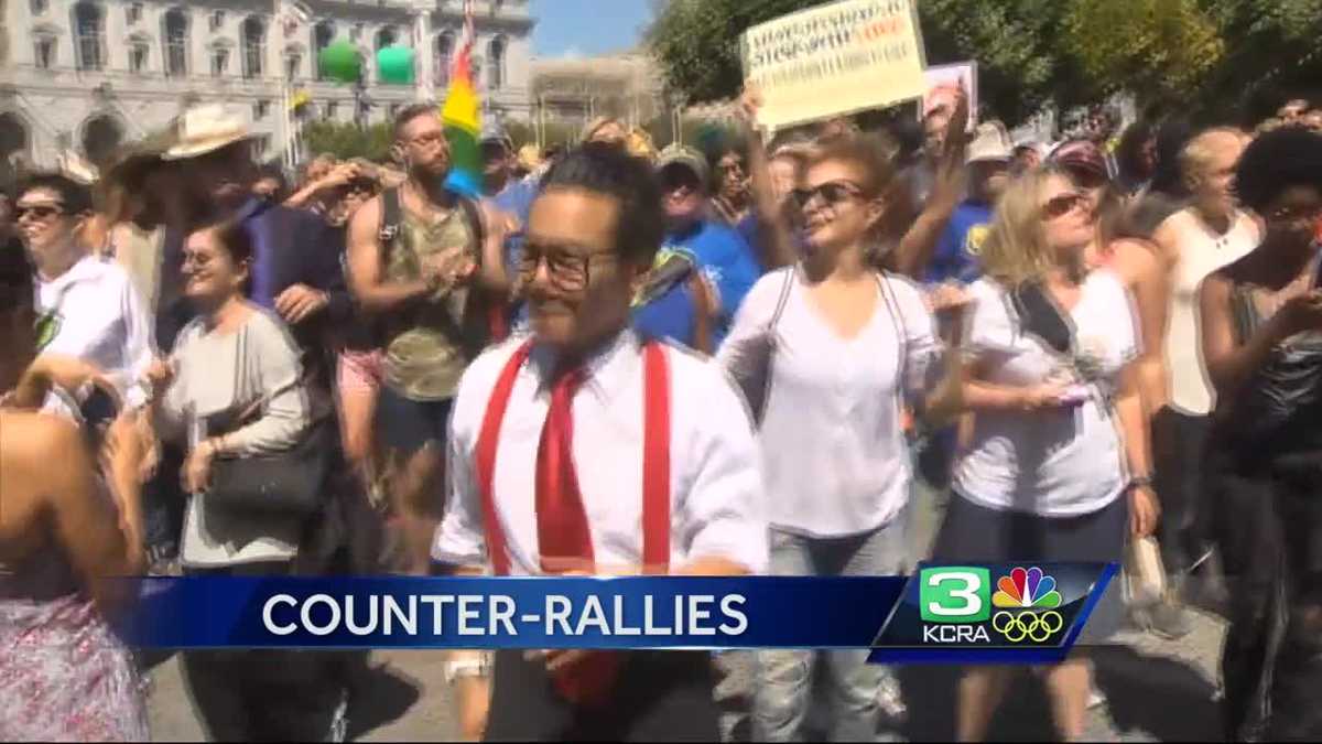Hundreds gather for unity near counter protests