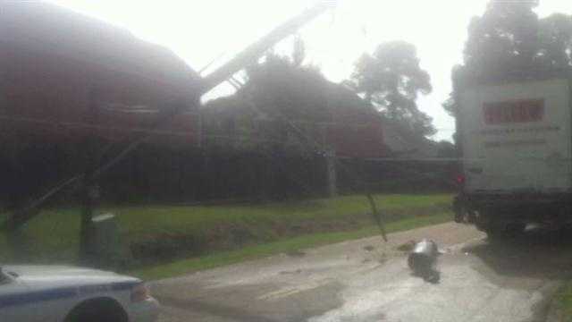 Truck hits power lines, knocks out power