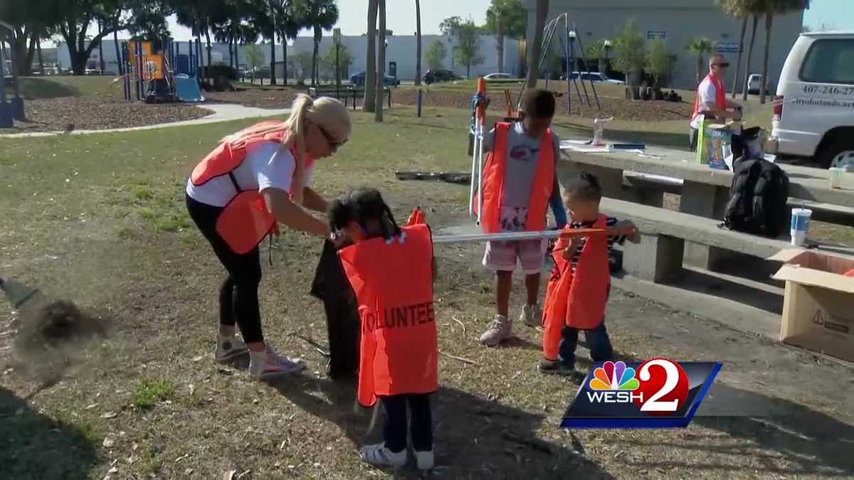 WWE stars trade trash talking for trash collecting in Orlando