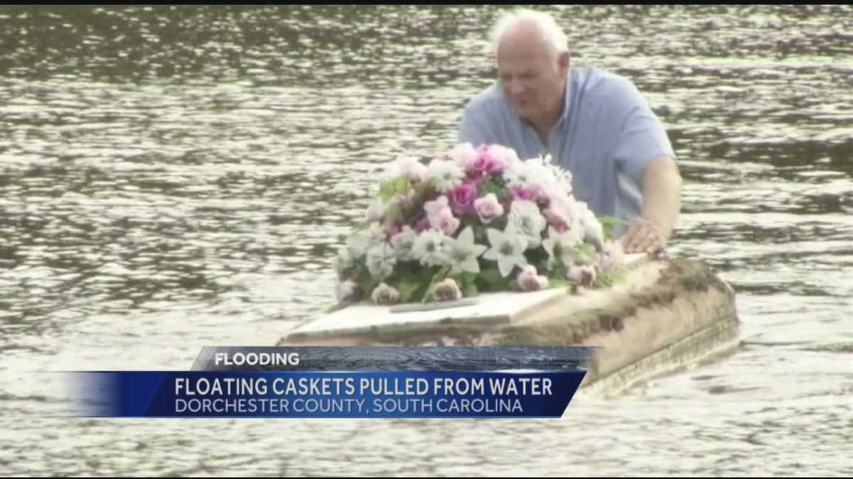 Man pulls floating casket from water
