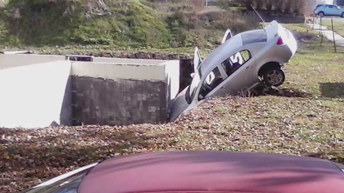 Teen leaves car dangling in home's foundation after high-speed chase