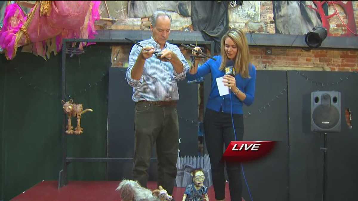 Ava plays with puppets for Free Fall Baltimore