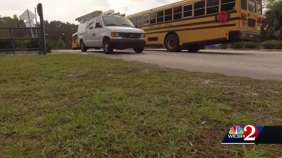 Bus monitor dragged by school bus