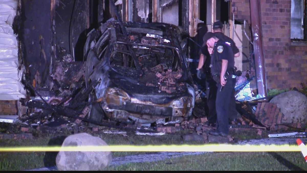 2 arrested after car crashes into apartment building, causes fire