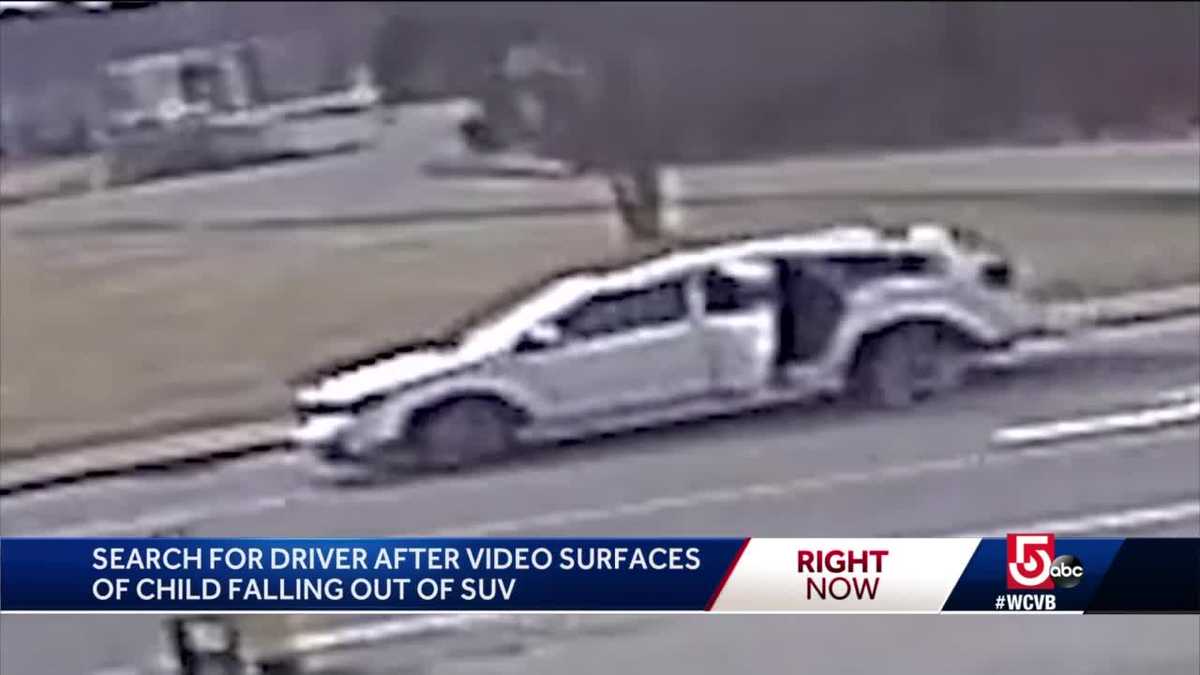 Young child opens door, falls out of moving vehicle onto road