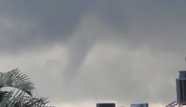 Florida videos show funnel clouds, rain, lightning during storm