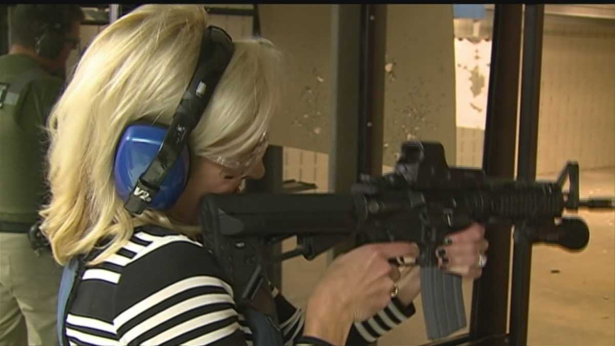 Melissa Fry receives hands-on training from law enforcement