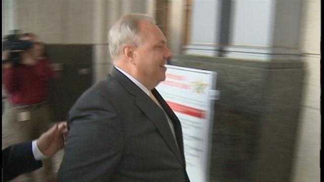 Jim Greer enters court on day of trial