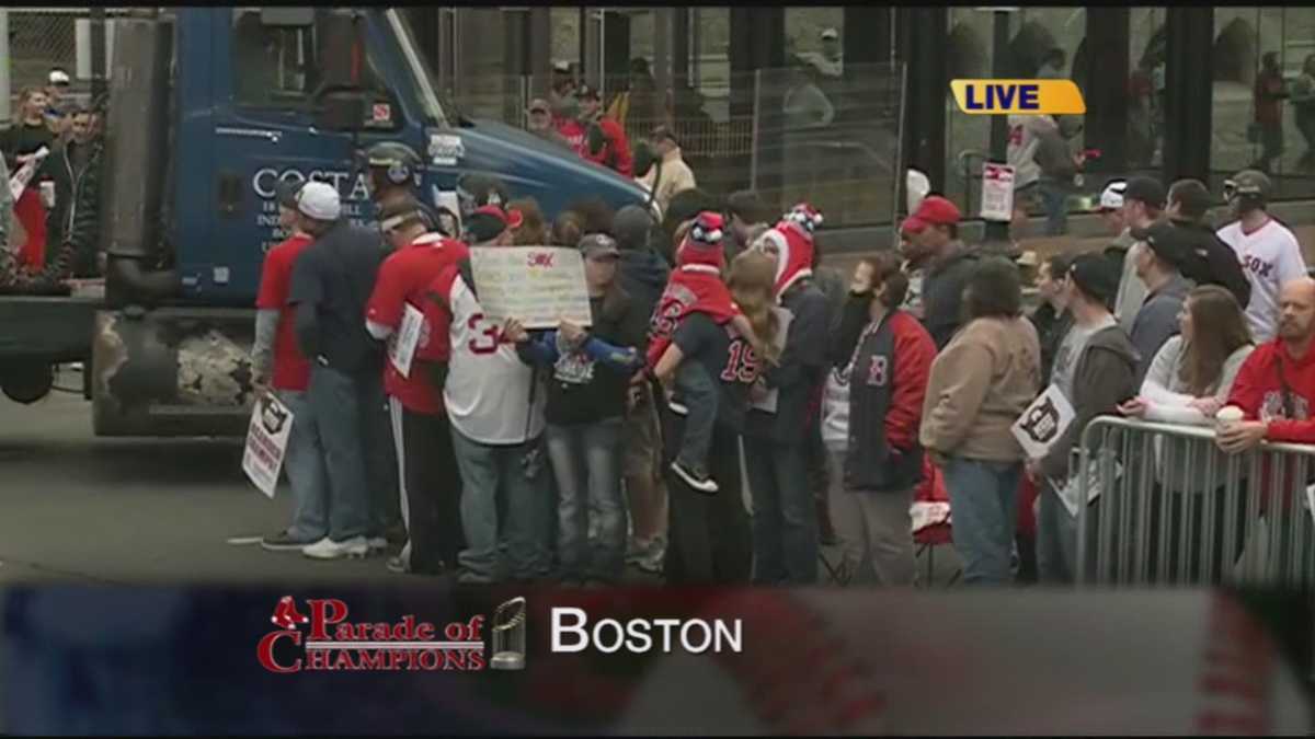 Fans packing along parade route near Boston Marathon finish line