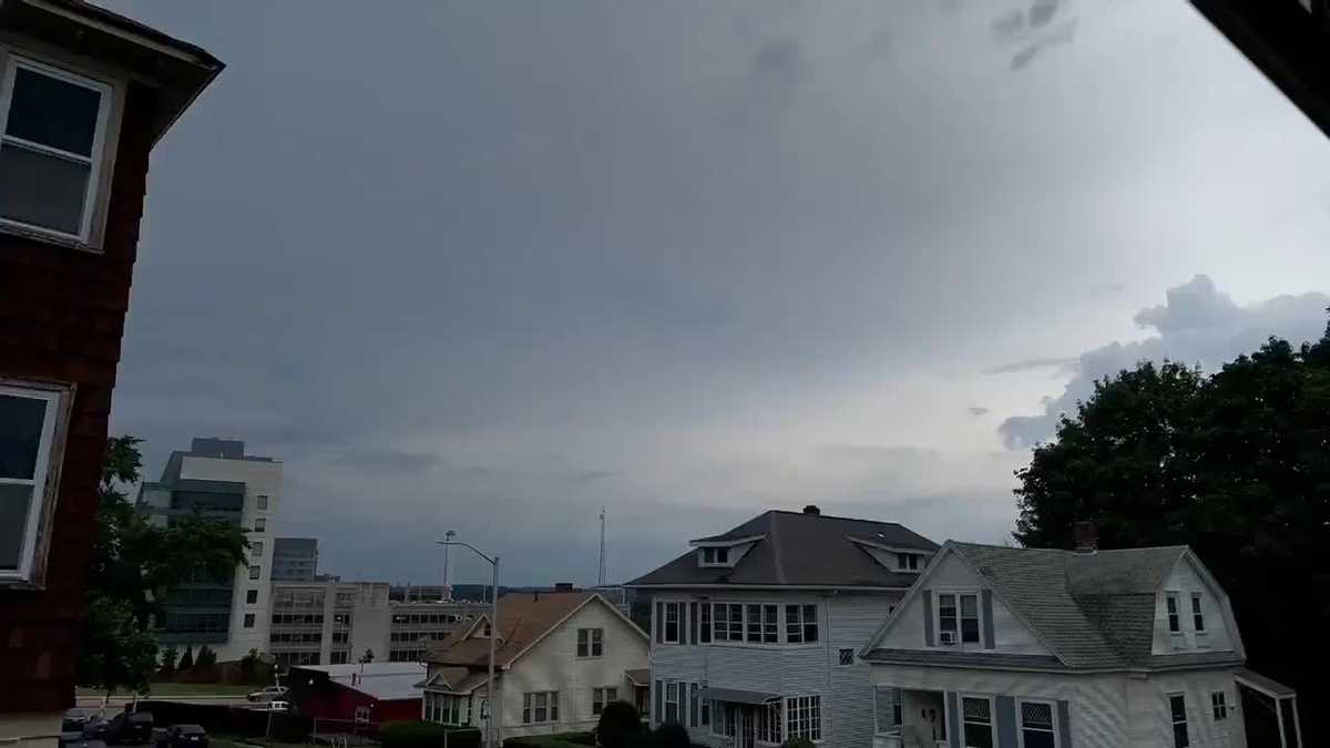 Storm transforms Worcester sky from day to night