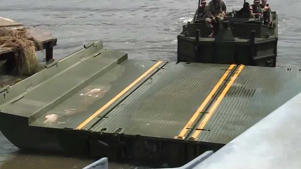 National Guard using floating bridge for emergency vehicles between ...