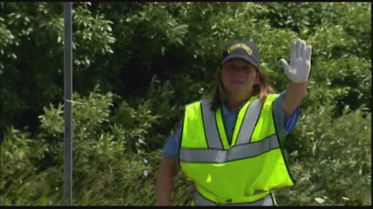 Dancing traffic guard helping Newtown heal