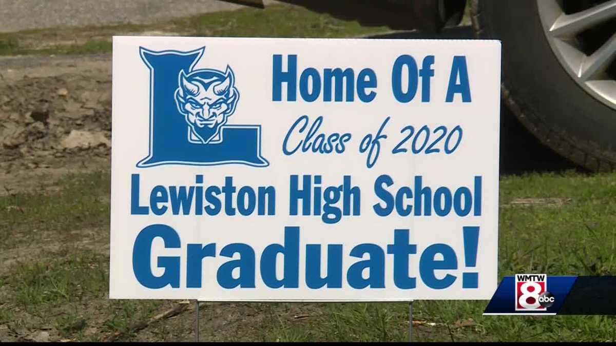 Lewiston High School principal delivers signs to recognize seniors