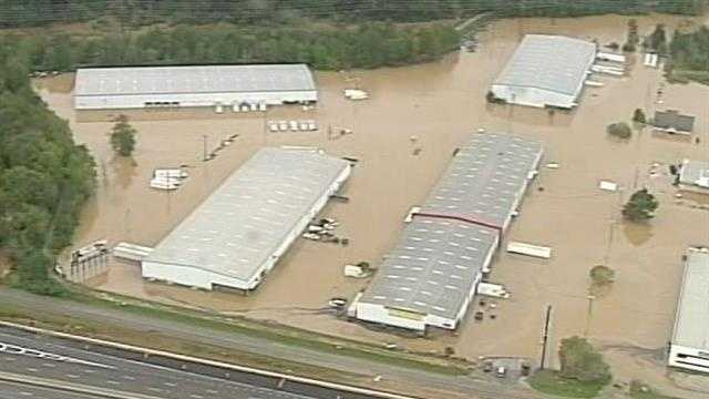 Flooding overtakes distribution center, businesses
