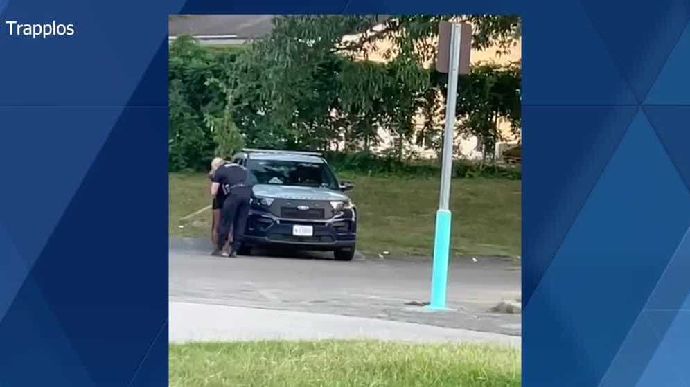 Video shows officer, woman kissing, getting into police cruiser