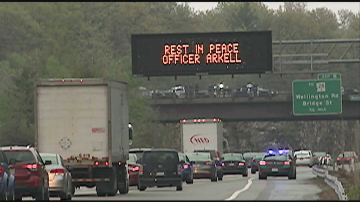 Officers honor Steve Arkell during procession