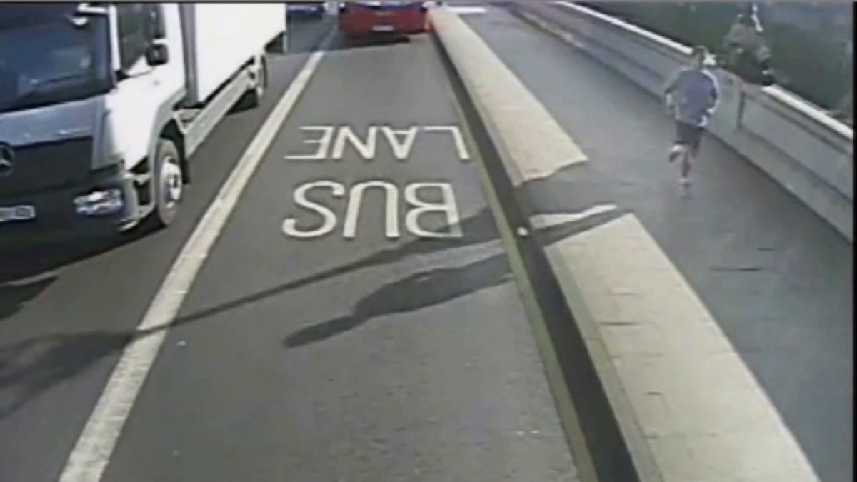 Caught On Camera Jogger Shoves Woman In Front Of Bus