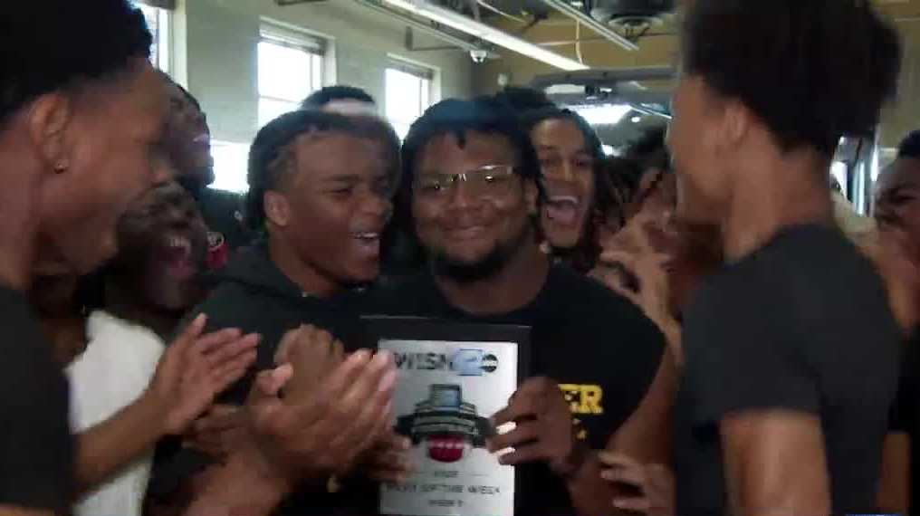 Brown Deer football player awarded Play of the Week plaque