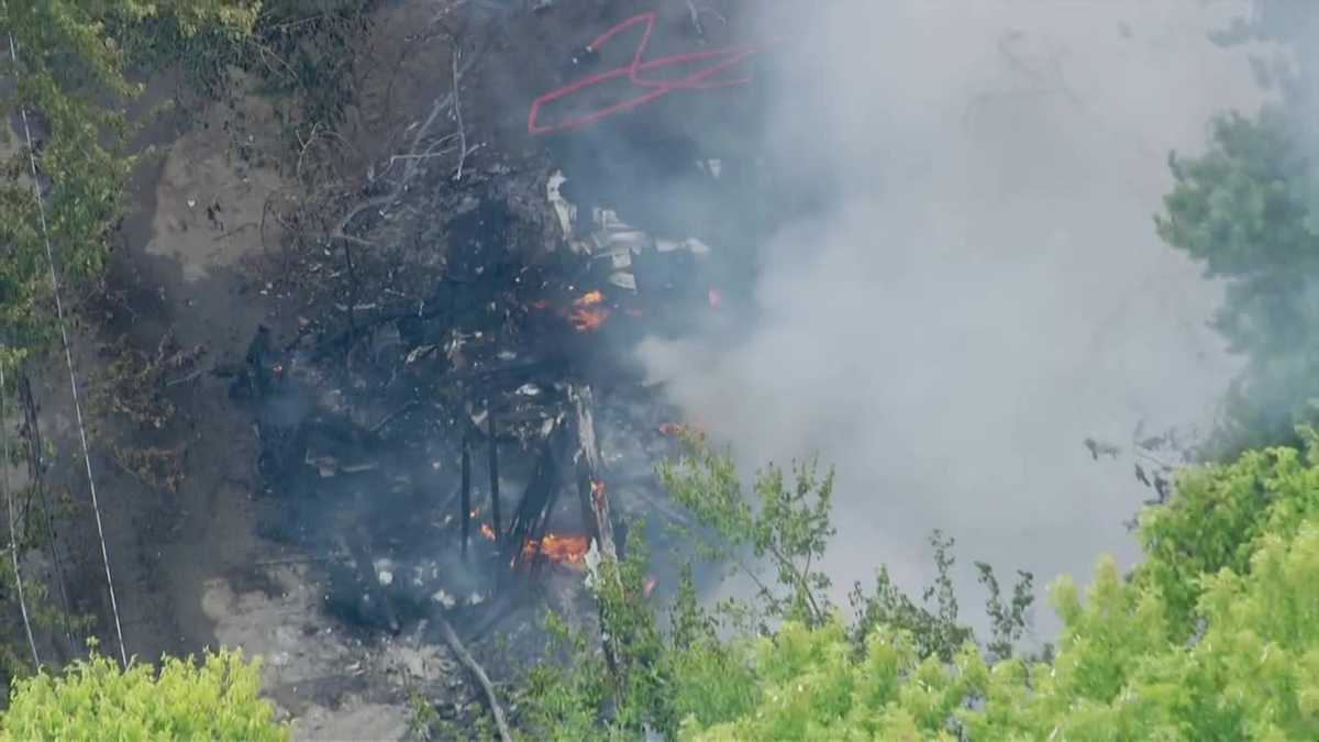Crews on the scene of garage fire in Russell neighborhood