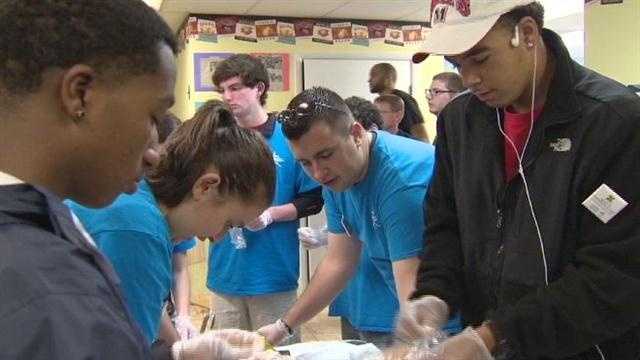 Ravens give honor row to Happy Helpers