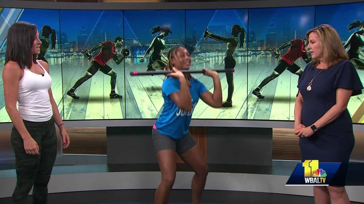 11 Fitness demonstrates how to use a body bar