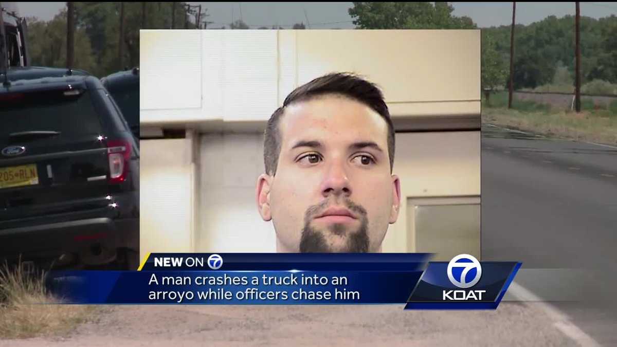 Man crashes truck into arroyo while chased by officers