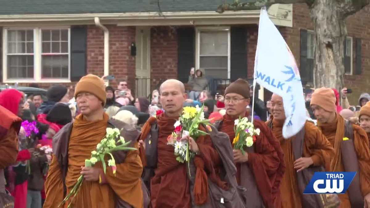 Hundreds gather to welcome 'Walk for Peace' monks to Lexington