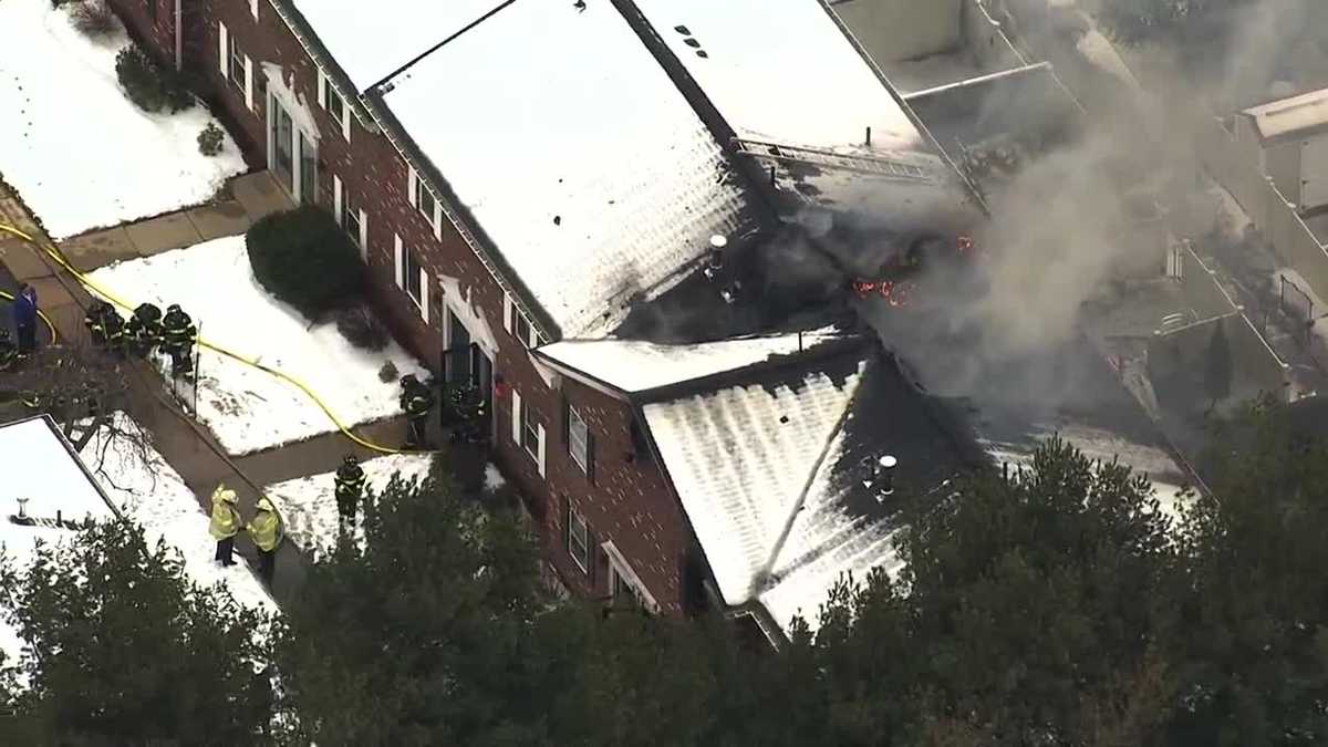 Firefighters battle flames in Framingham condo