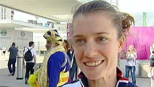 Runner Kim Conley tests the track