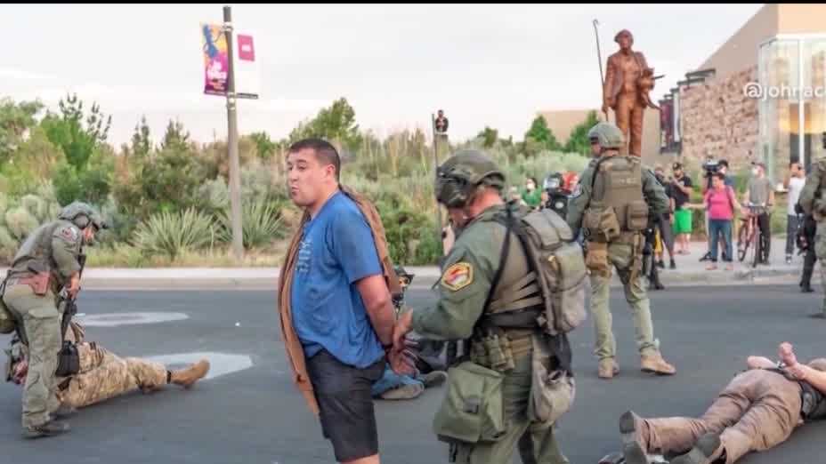 Shooting charges against man at ABQ protest off the table, for now