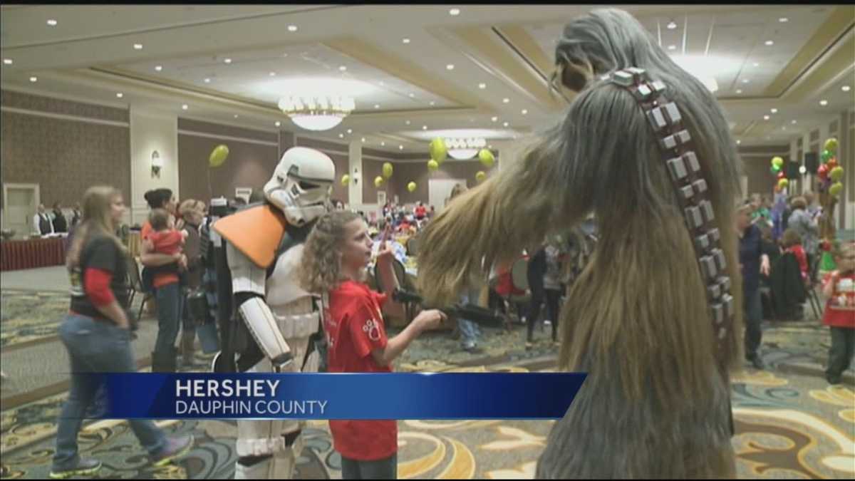 Star Wars characters entertain children at Miracle Party