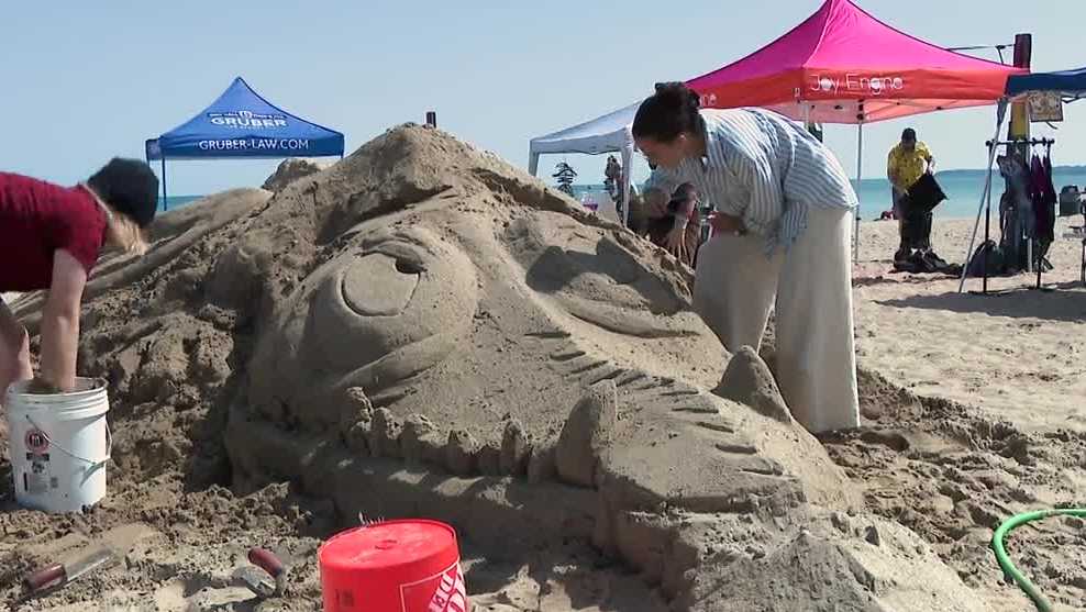 Massive sand dragon sculpted at Bradford Beach