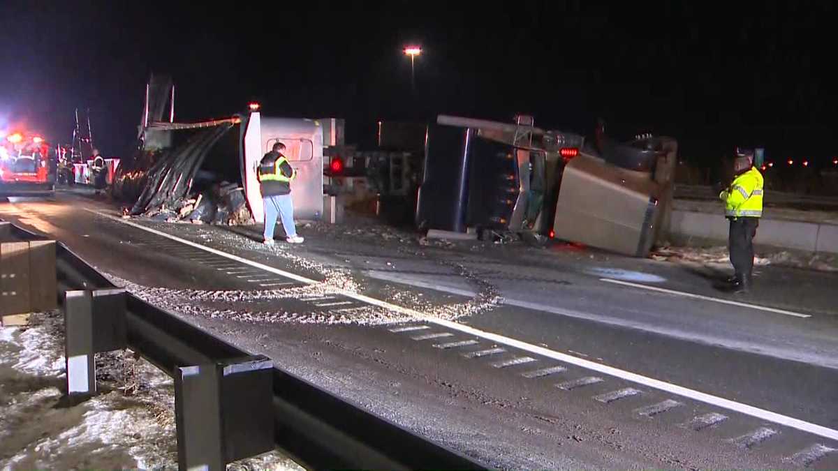 Tractor-trailer flips over, shuts down busy highway in Revere