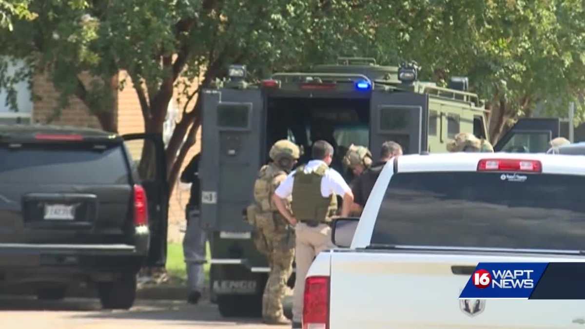 Armed robbery suspect dead, deputy hospitalized after standoff