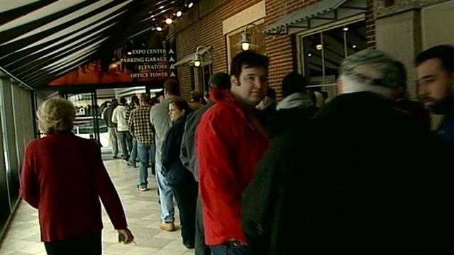 Long lines at a Manchester gun show Saturday