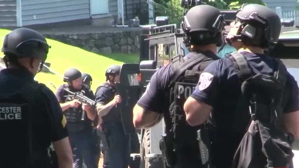 Standoff ends hours after 2 wounded, shots fired at police