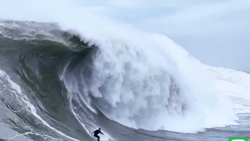 Pro surfers take on Mavericks with waves that hit 60 feet