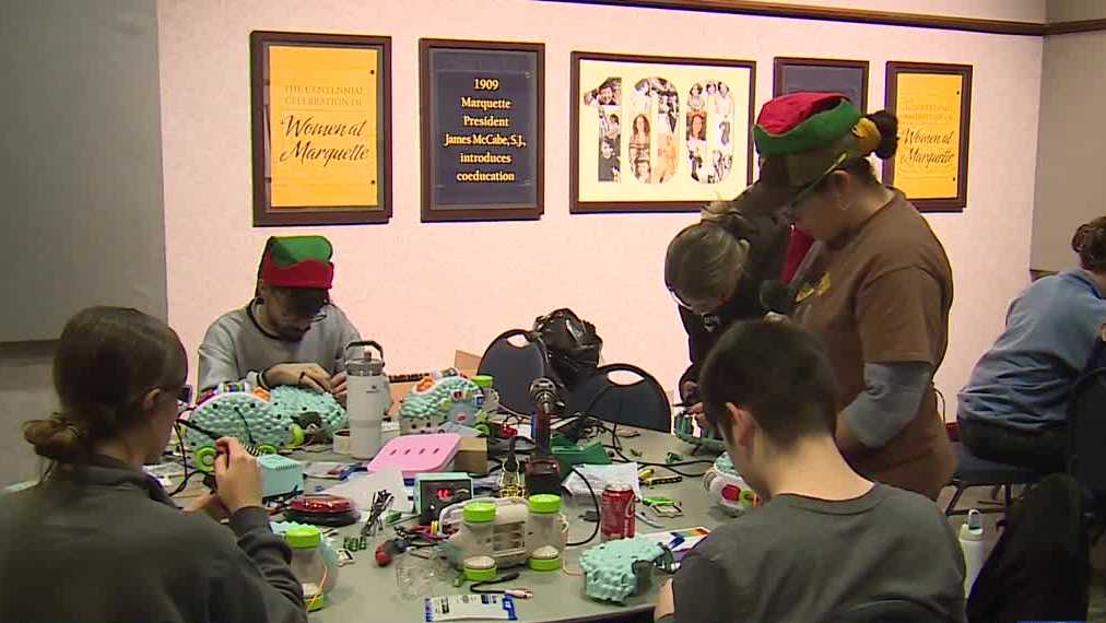 High school and college students work together to make toys more accessible