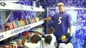 Ravens celebrate reading with new bookmobile