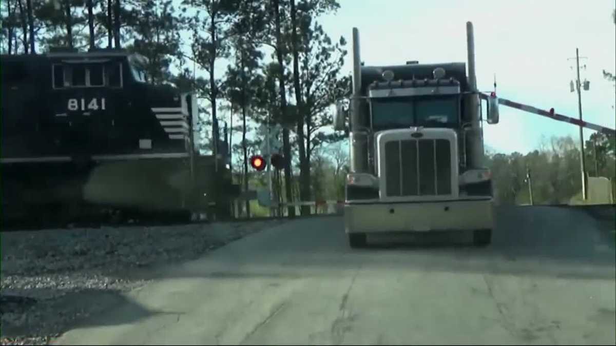RAW: Video shows moment train slams into semi-truck