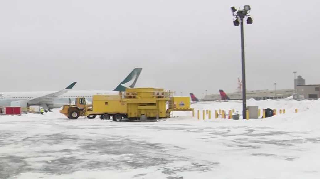 Logan Airport digging out from snow as operations slowly resume after ...