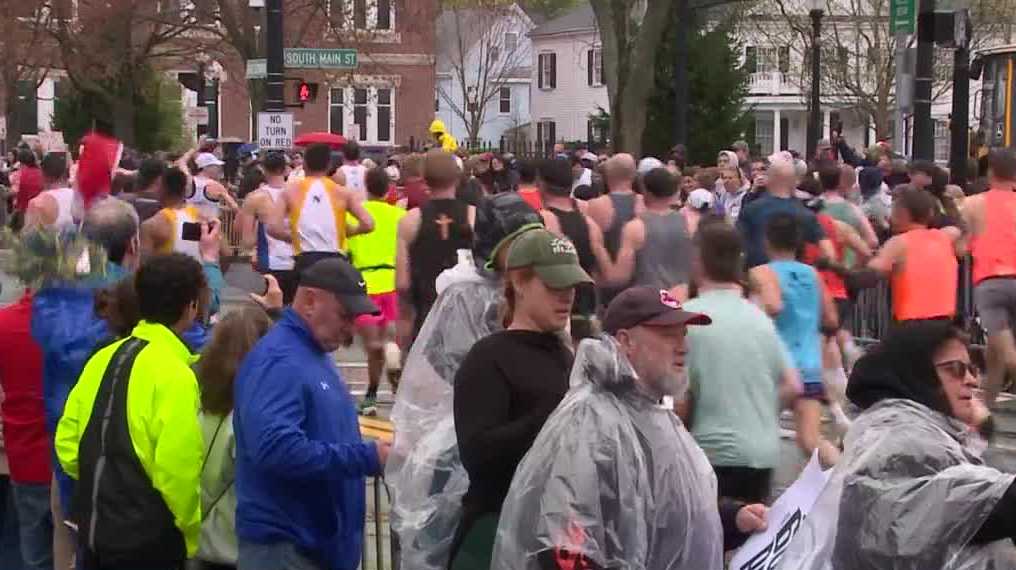 Thousands of spectators line up along route to cheer on Boston Marathon ...
