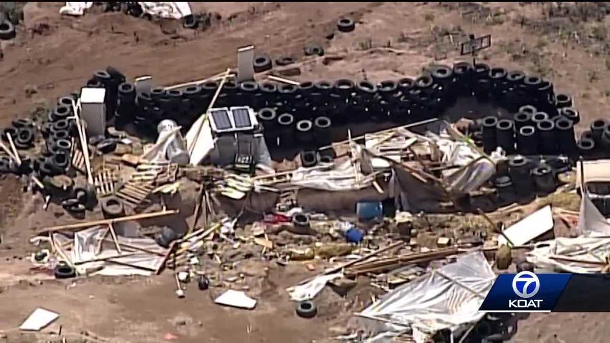 Officials say a camper trailer found at a compound was stolen