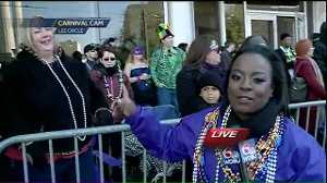 Back at Lee Circle: Gina Swanson says we're all family on Mardi Gras!