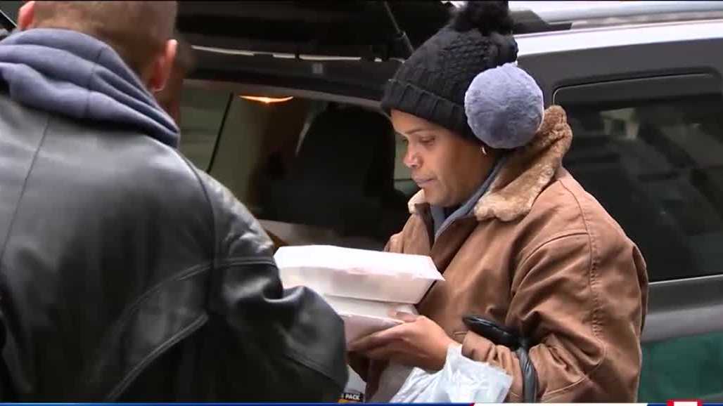 Volunteers serve dozens of Thanksgiving meals to homeless