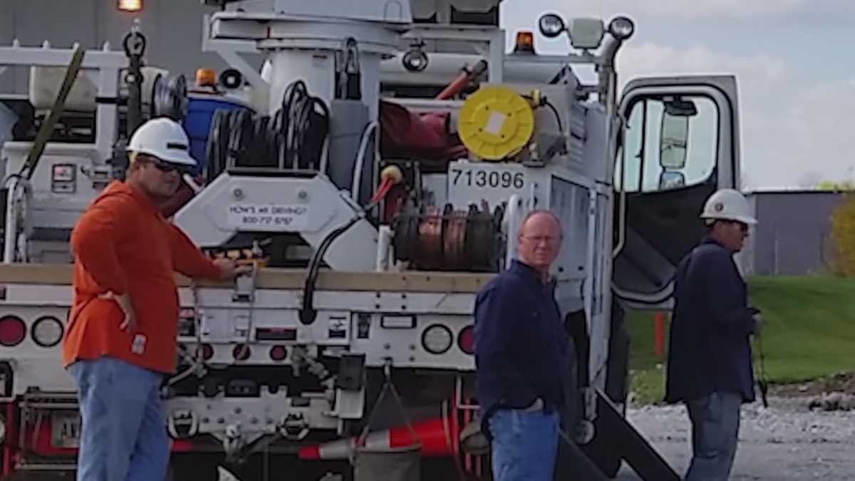 MidAmerican crew works to save man trapped under truck