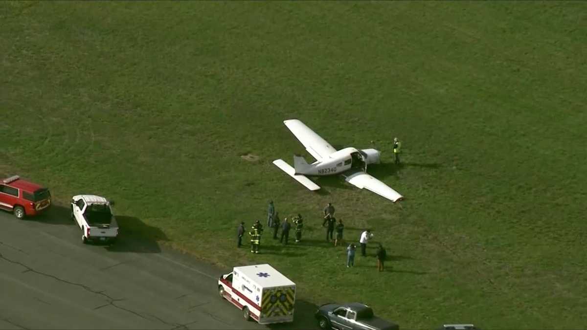 Small plane slides off runway at Beverly Airport